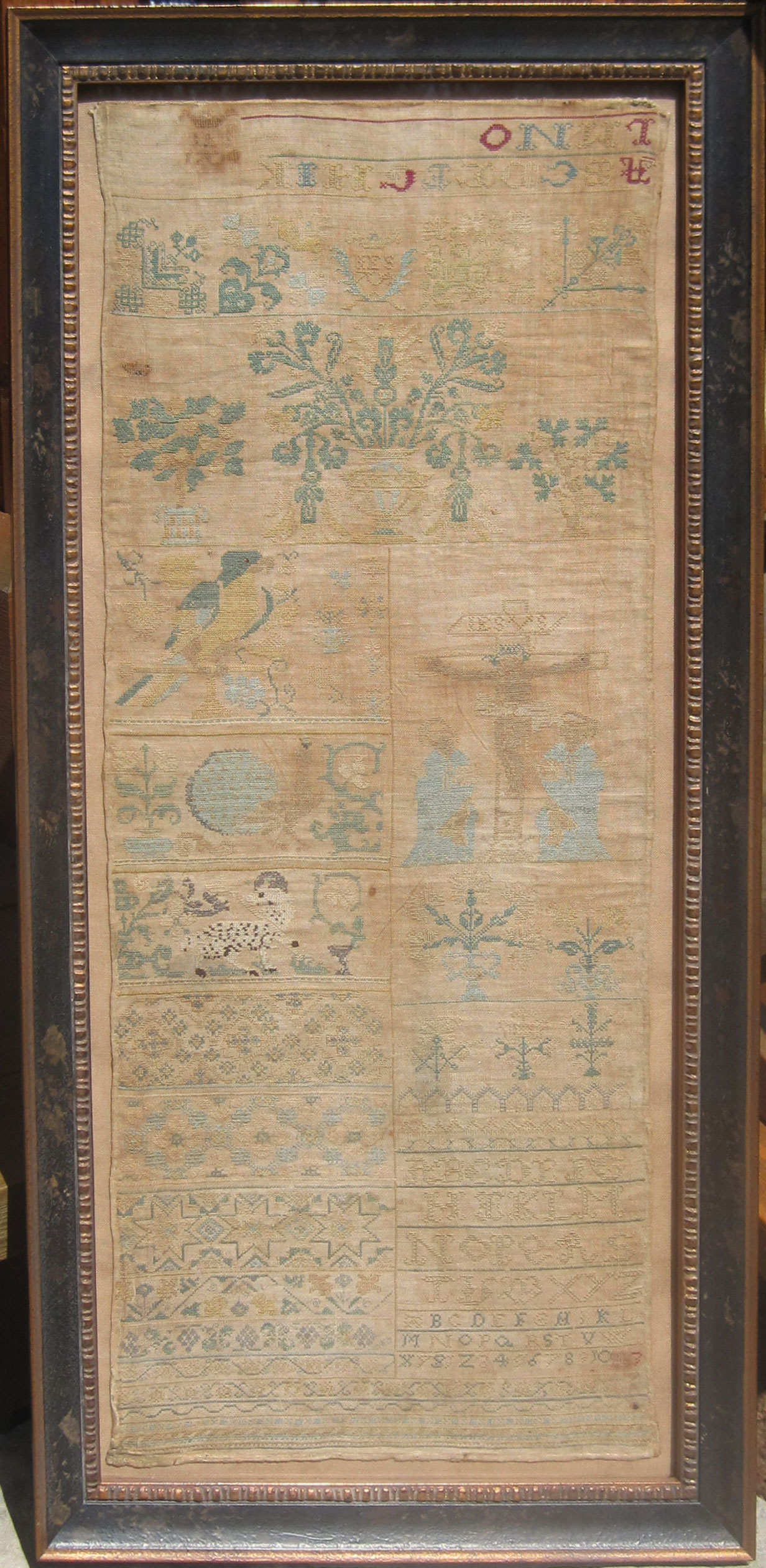 A German Sampler dated 1704 and Initialled by "IES" - Scarlet Letter